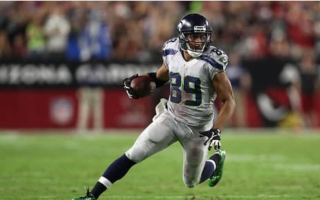 NFL Player, Son of Officer Says He Wants to Build Bridges Between ...